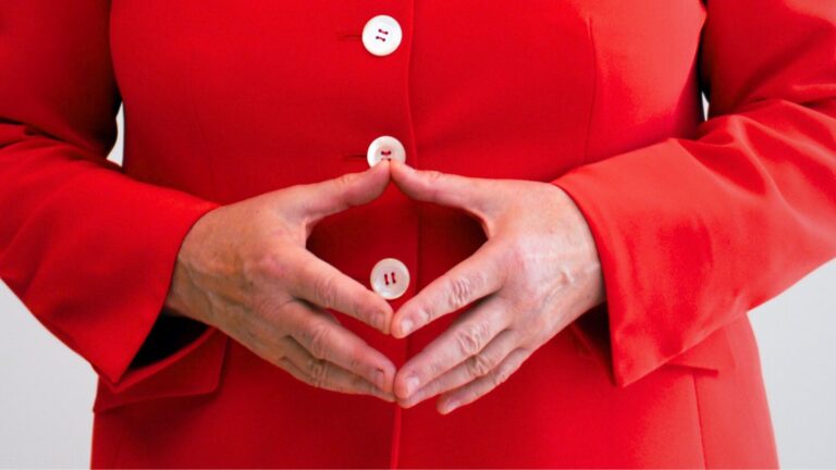 What does it mean to make a triangle gesture with your hands while ...