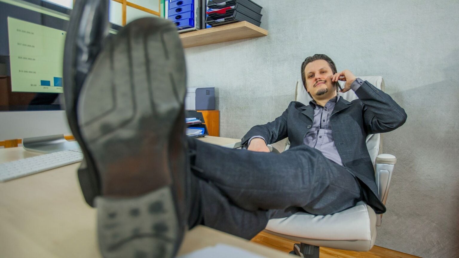 What does it mean to put your feet on the table, according to psychology?