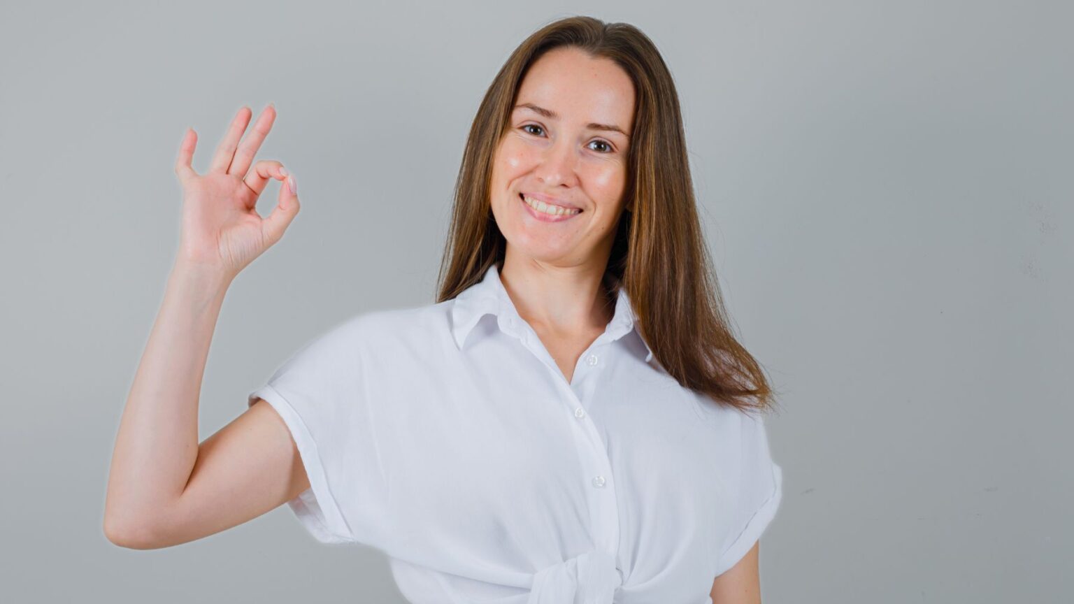 What does it mean to make the 'OK' hand gesture during a conversation ...