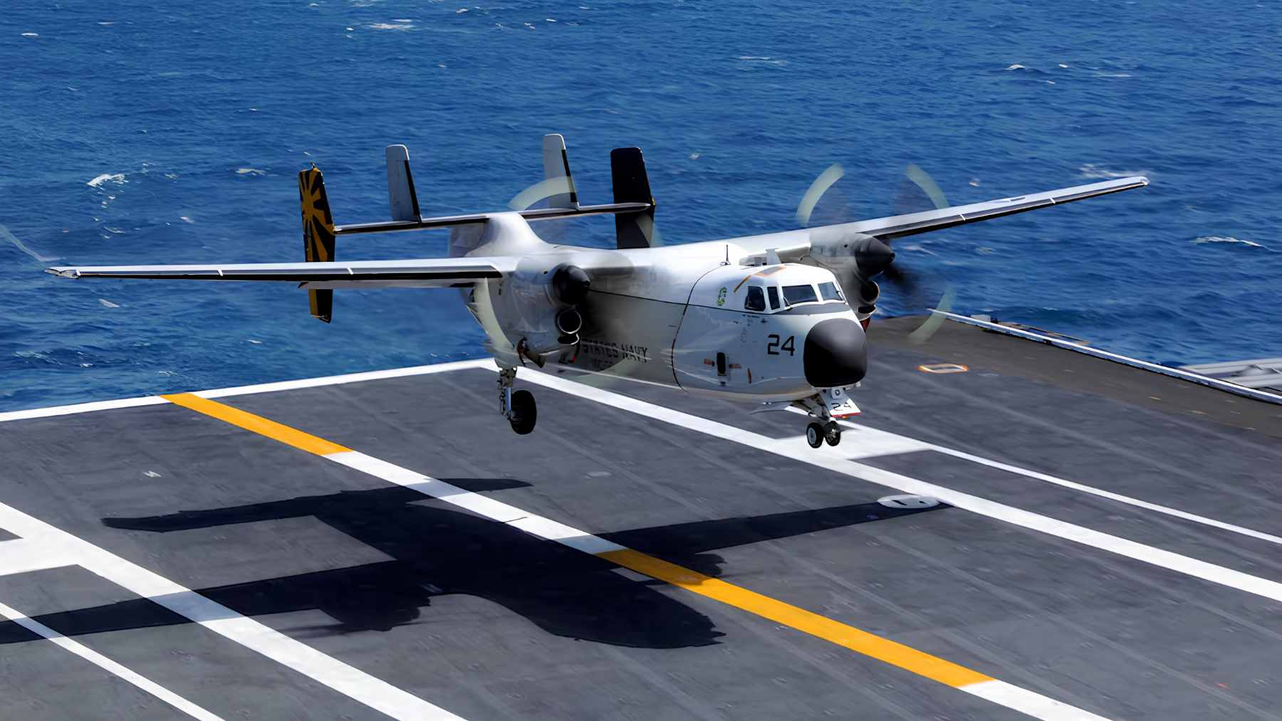 The C-2 Greyhound stops in 2 seconds on an aircraft carrier, carrying ...