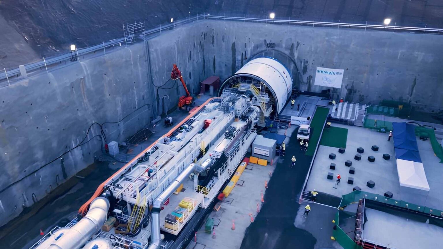A 152-wheel truck moves a 302,000-lb. tunnel-boring cutterhead, and the ...